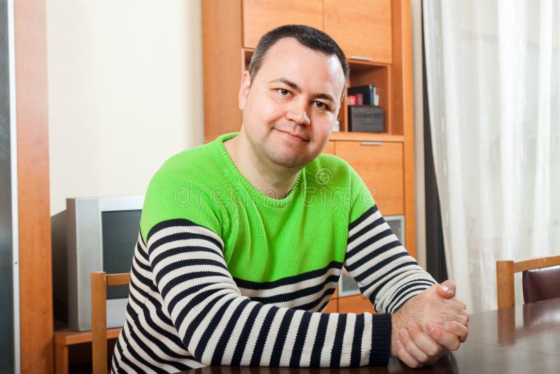 Man sitting at table stock image. Image of calm, camera - 49159817