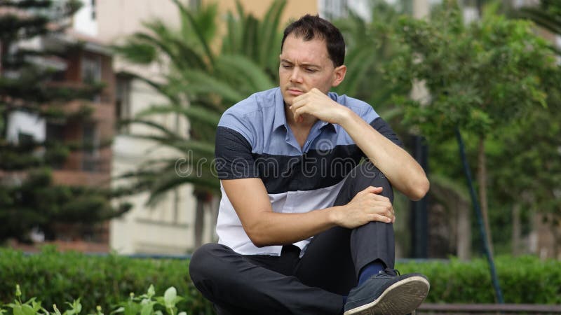 Man Sitting and Thinking stock image. Image of sitting - 88678205