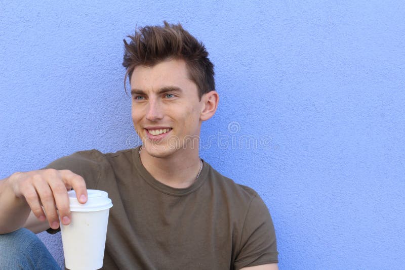 Man Sitting with To Go Cup of Coffee Looking Away Stock Photo - Image ...