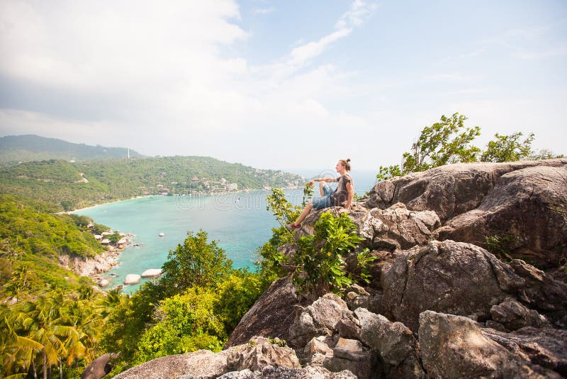 Man Sitting on Top of a Mountain and Enjoying View Stock Image - Image ...