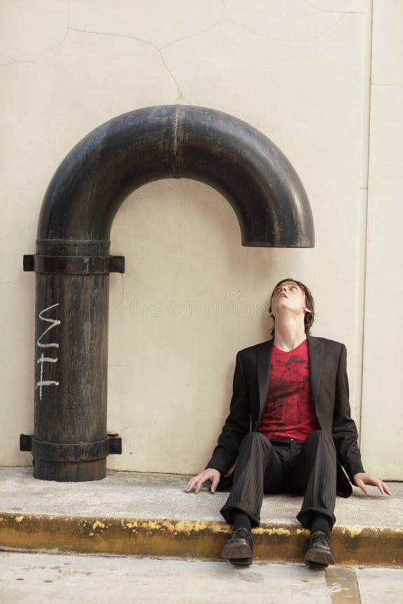 Man Sitting Under an Industrial Pipe Stock Photo - Image of shape, male ...