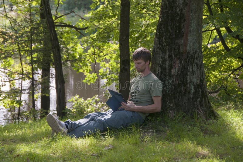 1,550 Man Sitting Under Tree Photos - Free & Royalty-Free Stock Photos ...