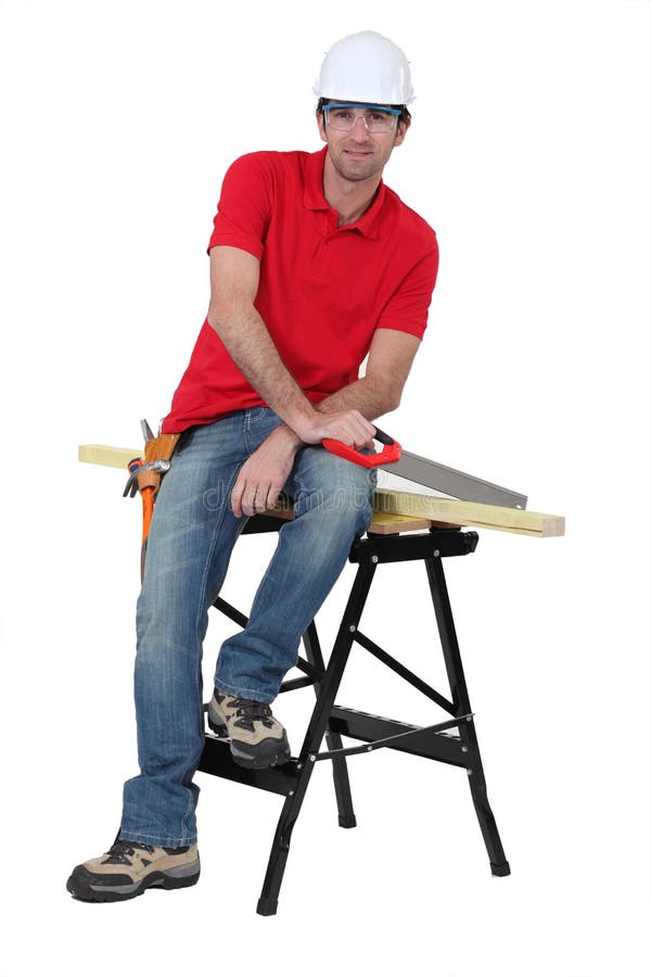 Carpenter sitting on bench stock photo. Image of standing - 51770410