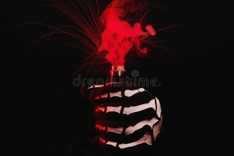 Skeleton Vaping Clouds of Red Highlighted Vapor with an Ecigarette ...