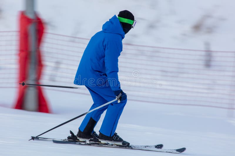 A Man is Skiing in the Snow. Stock Photo - Image of nature, action ...