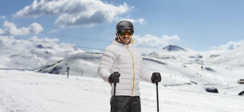 Man with Skis Posing on a Ski Resort Stock Image - Image of happiness ...