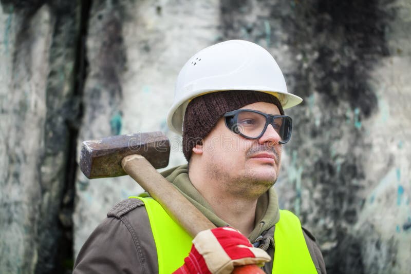 Man with sledge-hammer stock photo. Image of occupation - 35413470