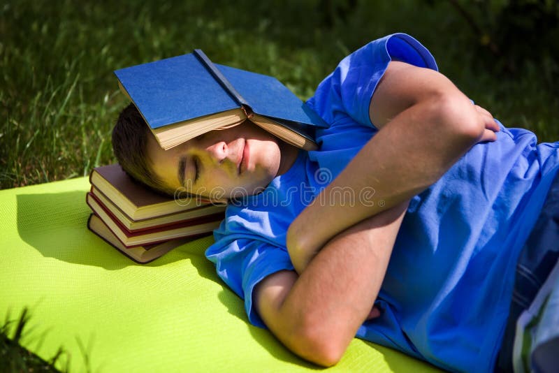 Man sleep with a Book stock image. Image of read, grass - 138023625