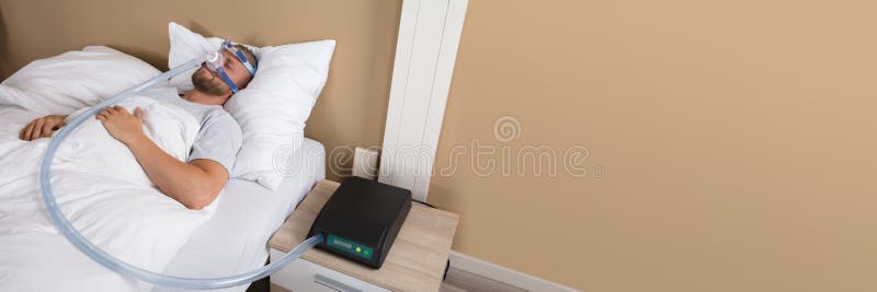 Man with Sleeping Apnea and CPAP Machine Stock Photo - Image of care ...