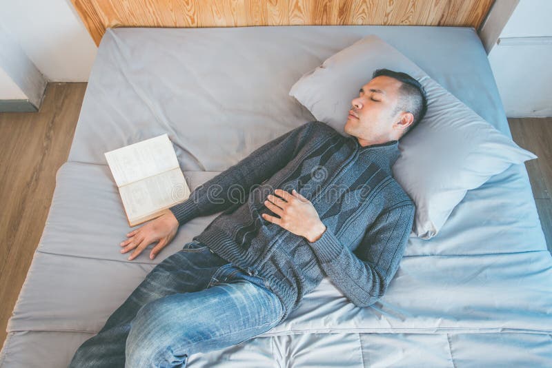 Sleep after book stock photo. Image of people, pajamas - 114286696