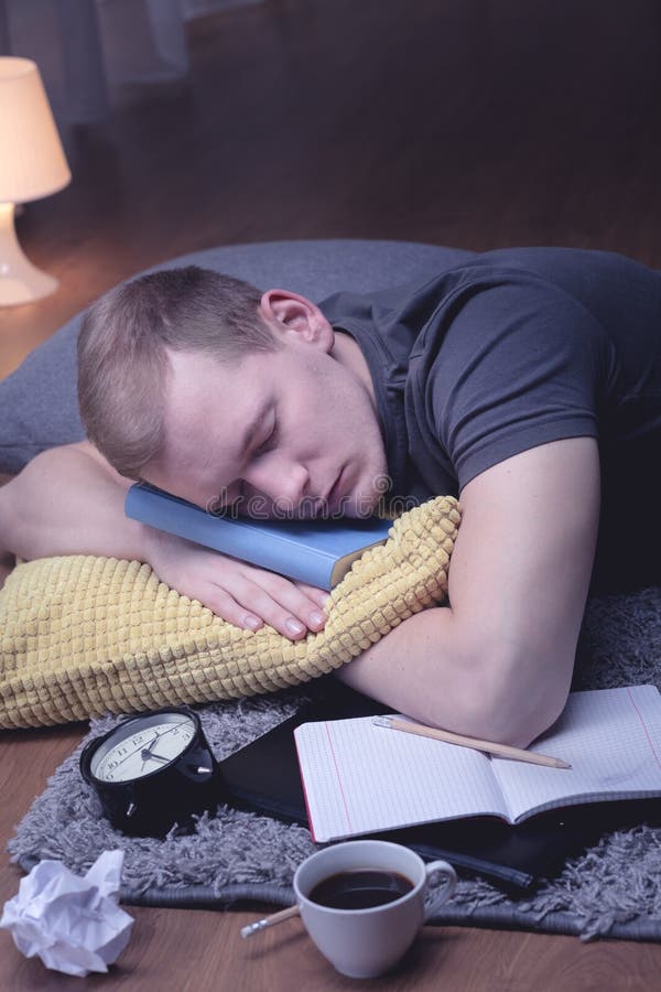 Man sleeping with notebook stock photo. Image of session - 64679932