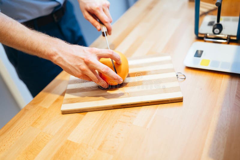 Slicing an Orange To Make Fresh Orange Juice. Healthy Lifestyle Comcept ...