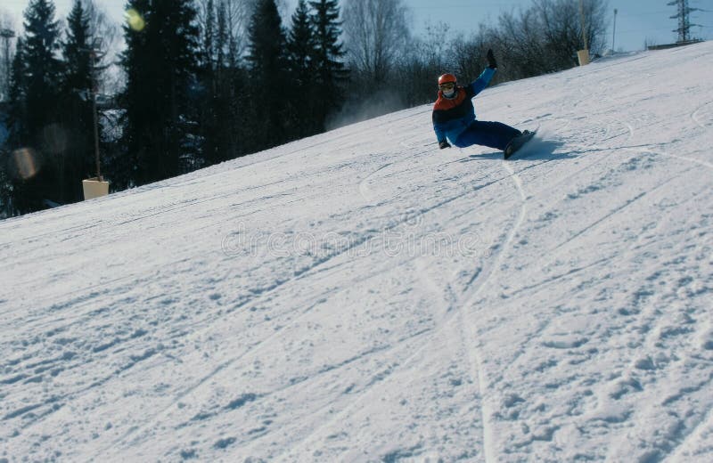 Man Slides on a Snowboard and Ski from Snow Descent. Stock Image ...