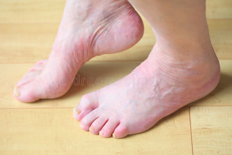 Man with Both Feet on Floor Stock Image - Image of toes, light: 118752381