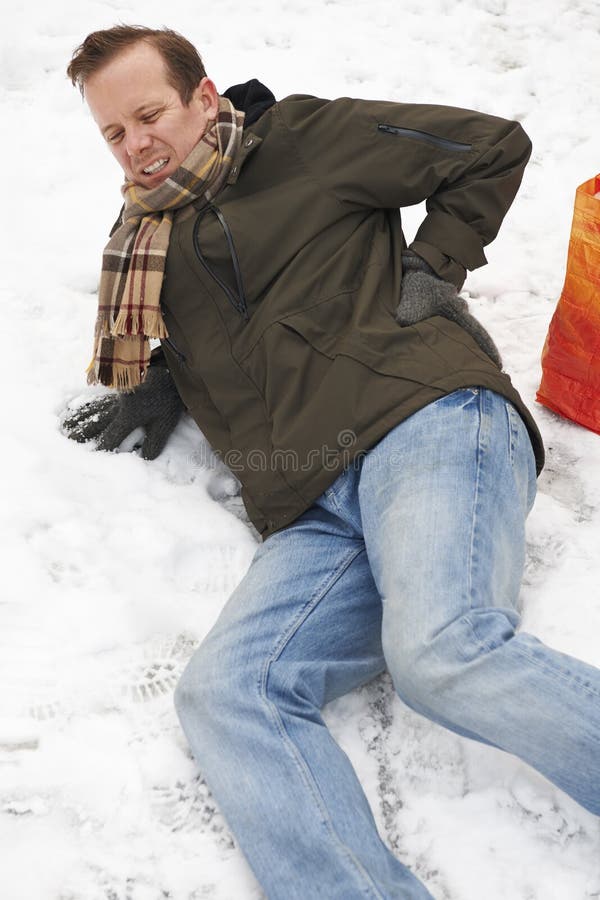 Man Slipping Over in Snowy Street Stock Image - Image of person ...
