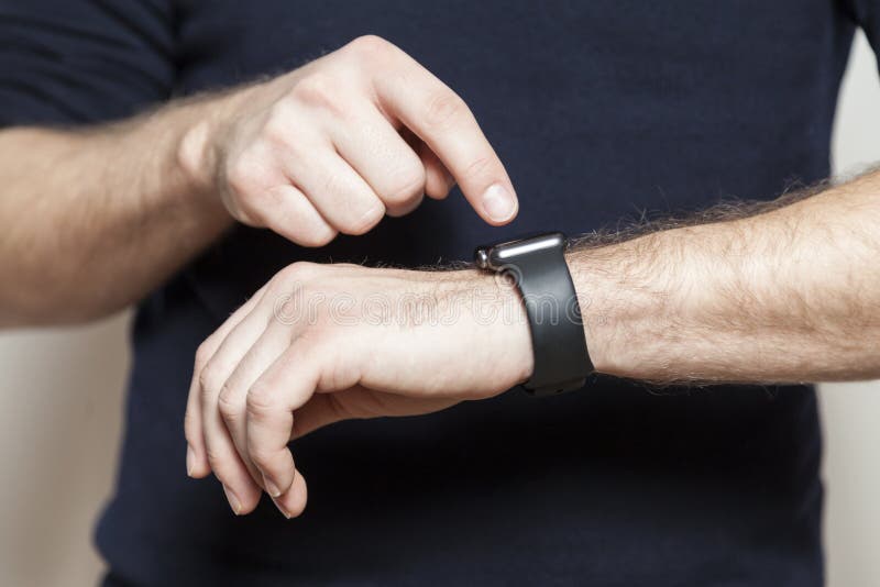 Man with smart watch stock image. Image of wrist, male - 64981353