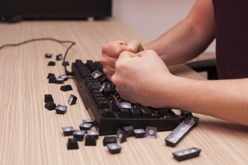 Man Smashes a Mechanical Computer Keyboard in Rage Using Both Fists ...