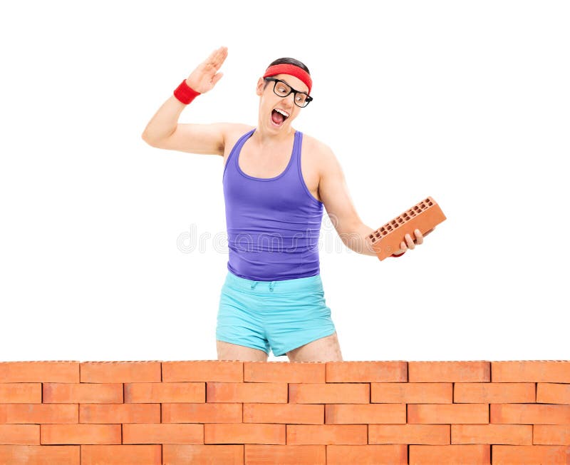 Man Smashing a Brick Behind a Wall Stock Photo - Image of lifestyle ...