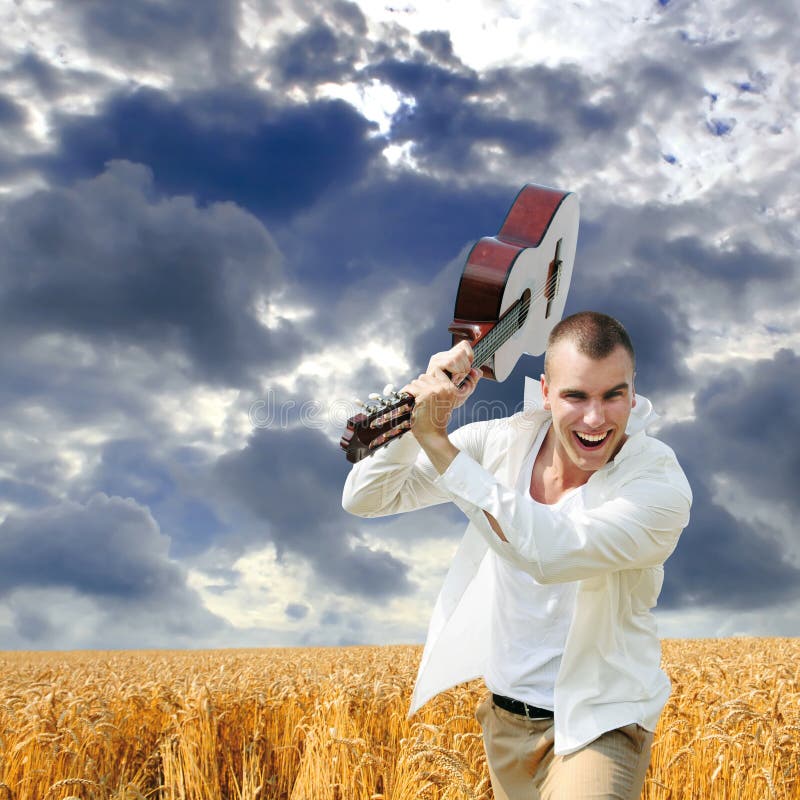Man smashing guitar stock image. Image of enthusiasm - 10770919