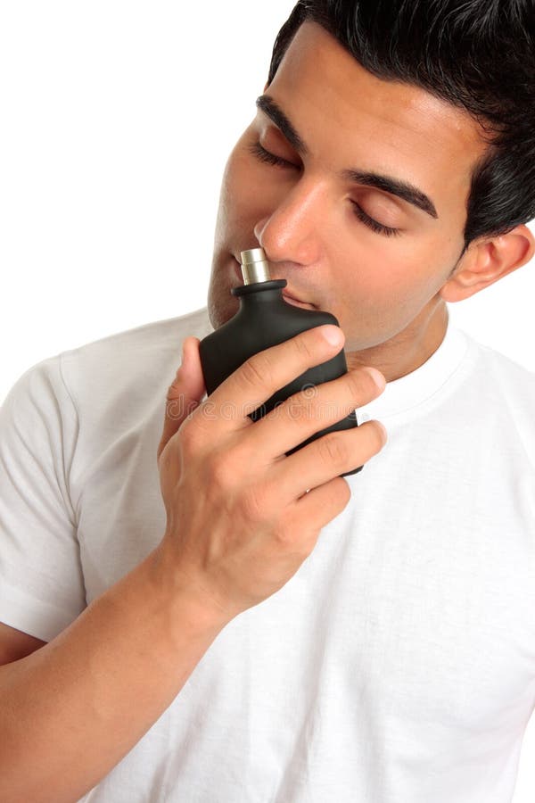 Man Smelling Aftershave Cologne Stock Photo - Image of bottle ...