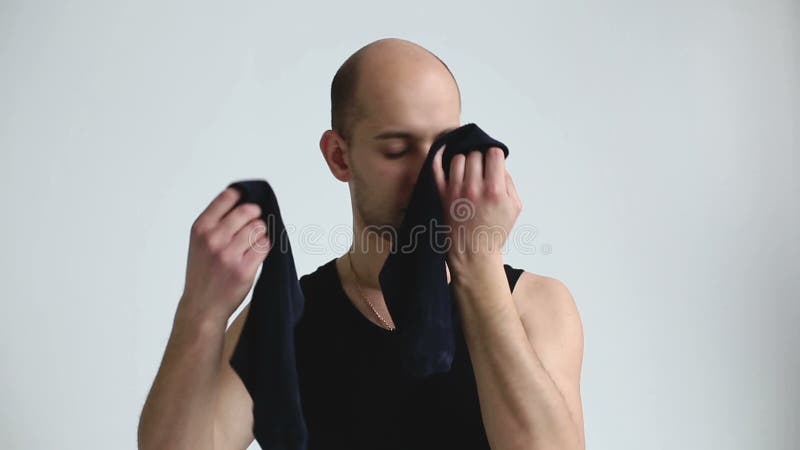 Man is smelling his socks stock video. Video of pockets - 49162557