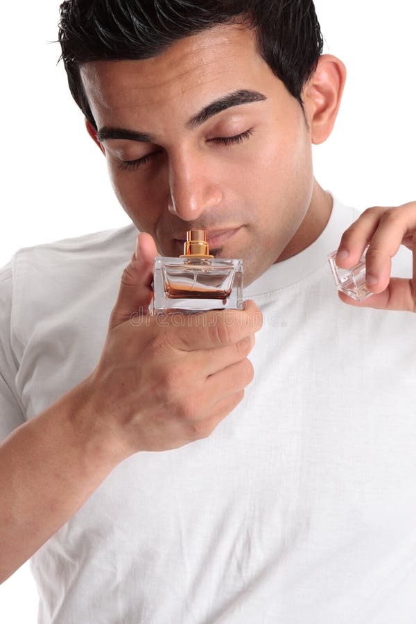 Man smelling perfume stock photo. Image of white, smelling - 13143842