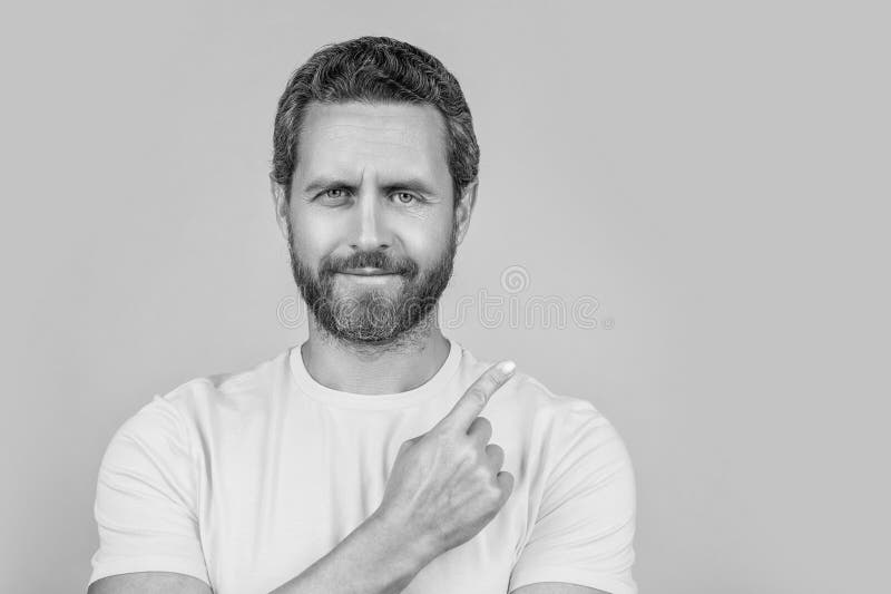 Man Smile Pointing at Advertisement Offer in Studio. Photo of Man ...