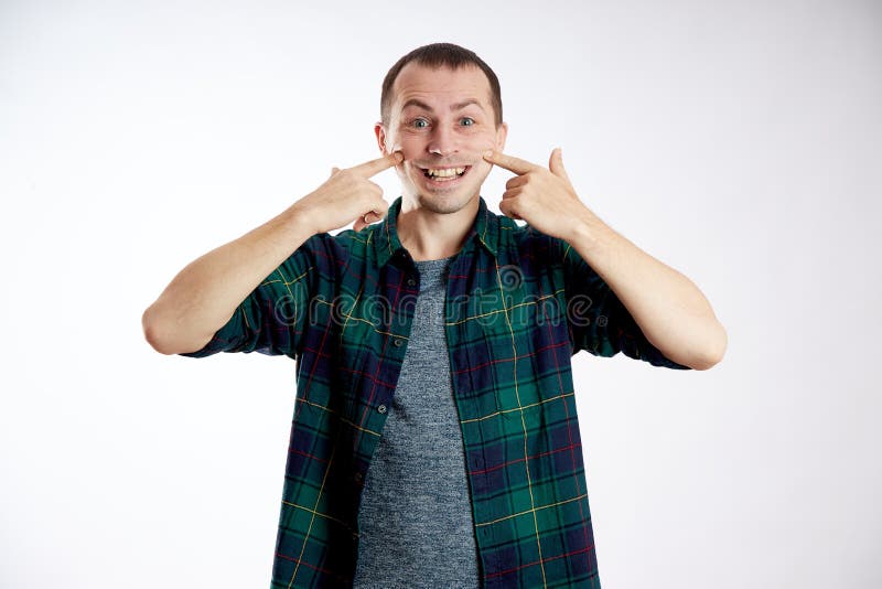 Man Smiles, a Happy Contented Face. a Guy in a Shirt Posing Stock Image ...