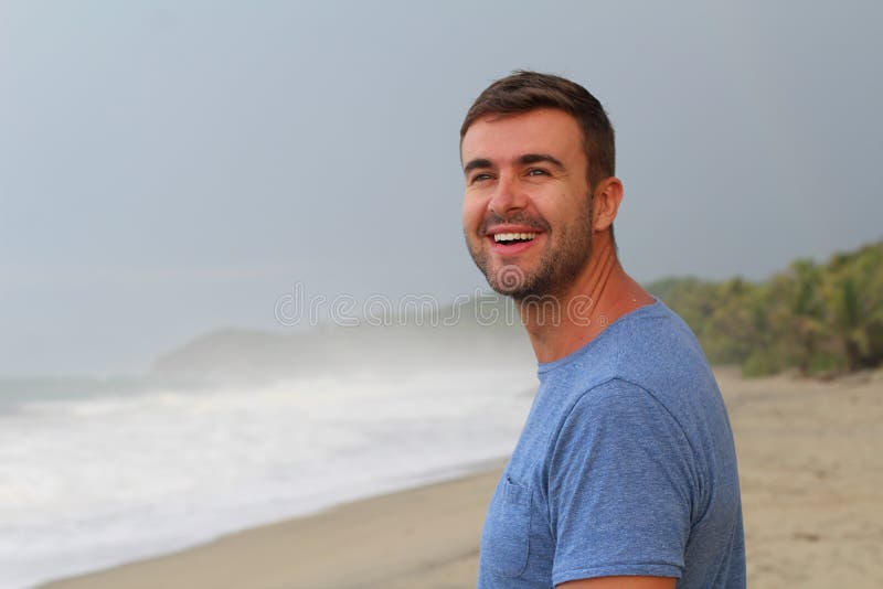 Man Smiling at the Beach with Copy Space Stock Photo - Image of beach ...
