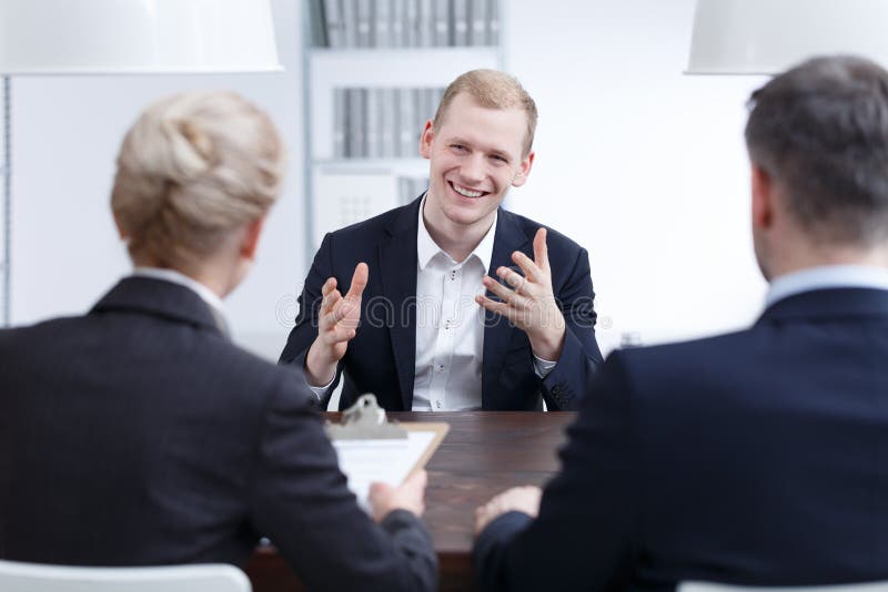 Man Smiling on Job Interview Stock Photo - Image of company ...