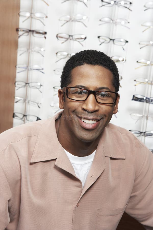 Man Smiling at Spectacles Shop Stock Photo - Image of happy, occupation ...