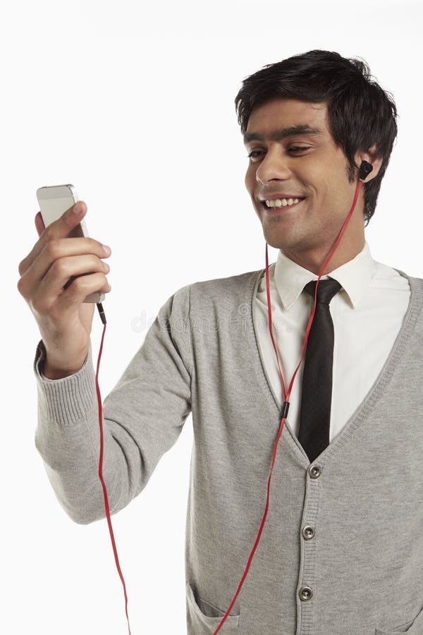 Man Smiling and Using Mobile Phone Stock Photo - Image of 2529, phone ...