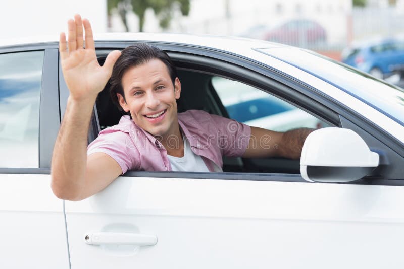 Man smiling and waving stock photo. Image of transport - 50492402