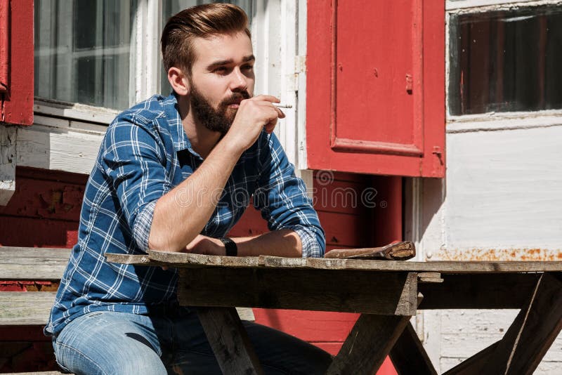 Man is Smoking Cigarette Durring His Rest Break Stock Image - Image of ...