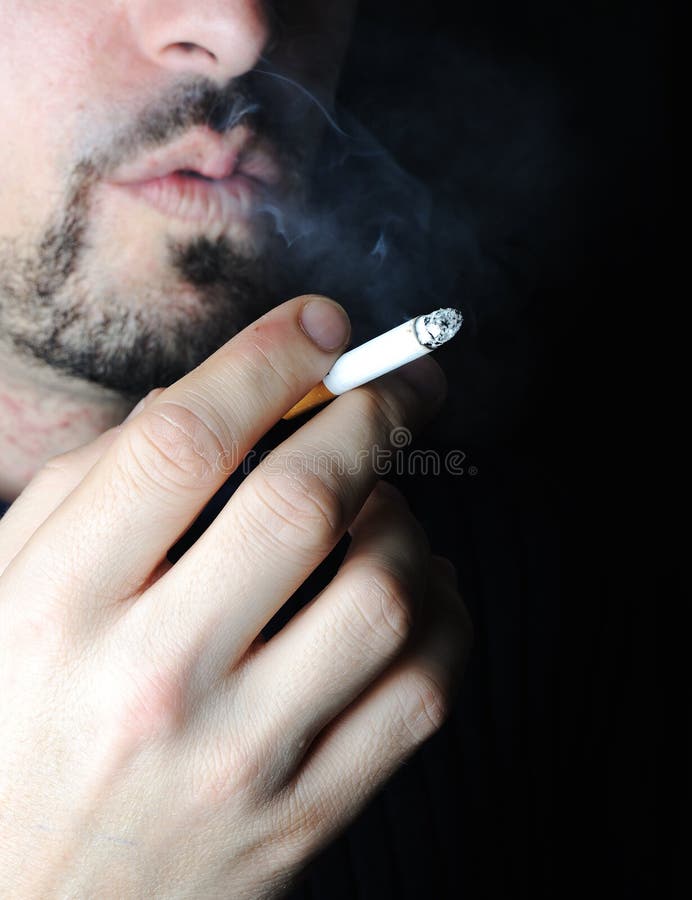 Man smoking in dark stock photo. Image of cigarette, addicted - 13458508