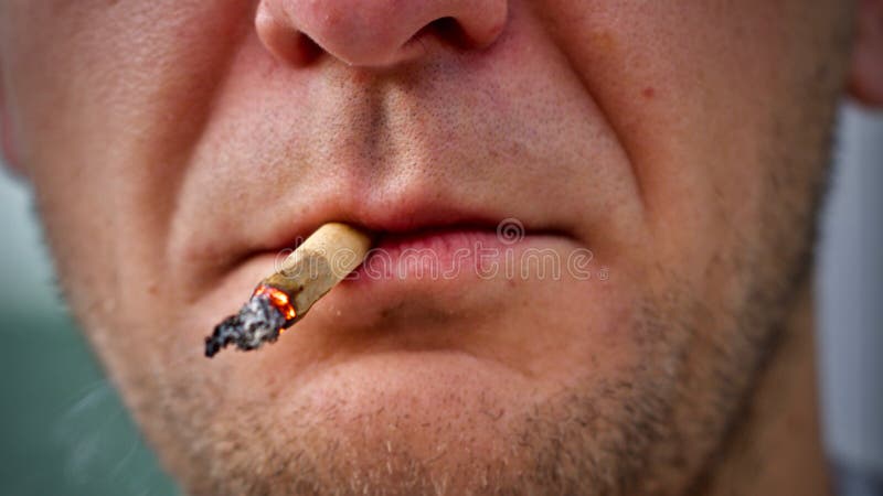 Man smoking marijuana stock photo. Image of spliff, addict - 124003572