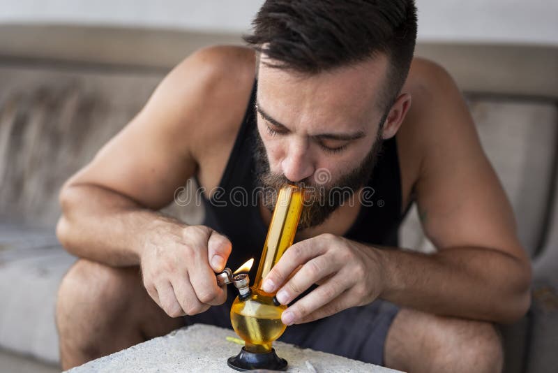 Man smoking marijuana stock image. Image of high, dealer - 130808281