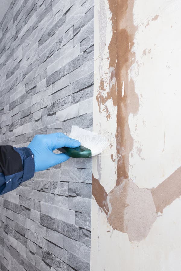 Man Smoothing Wallpaper with a Brush. Stock Image - Image of brush ...