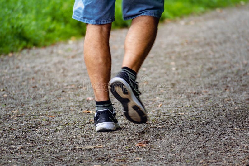 Man with Sneakers Running on a Path, Helathy Activity To Make Exercice ...