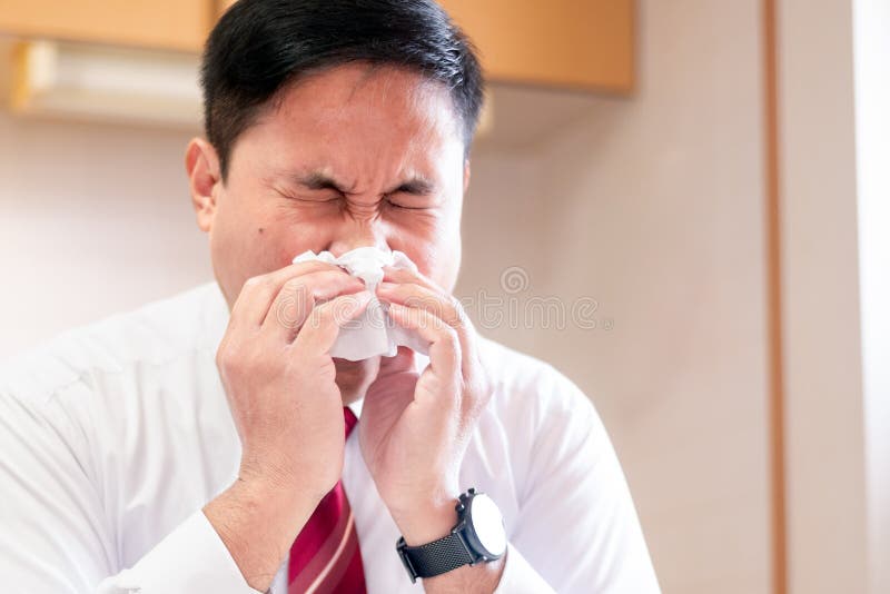 Man Sneezes Due To Flu and Uses Tissue. Stock Image - Image of ...