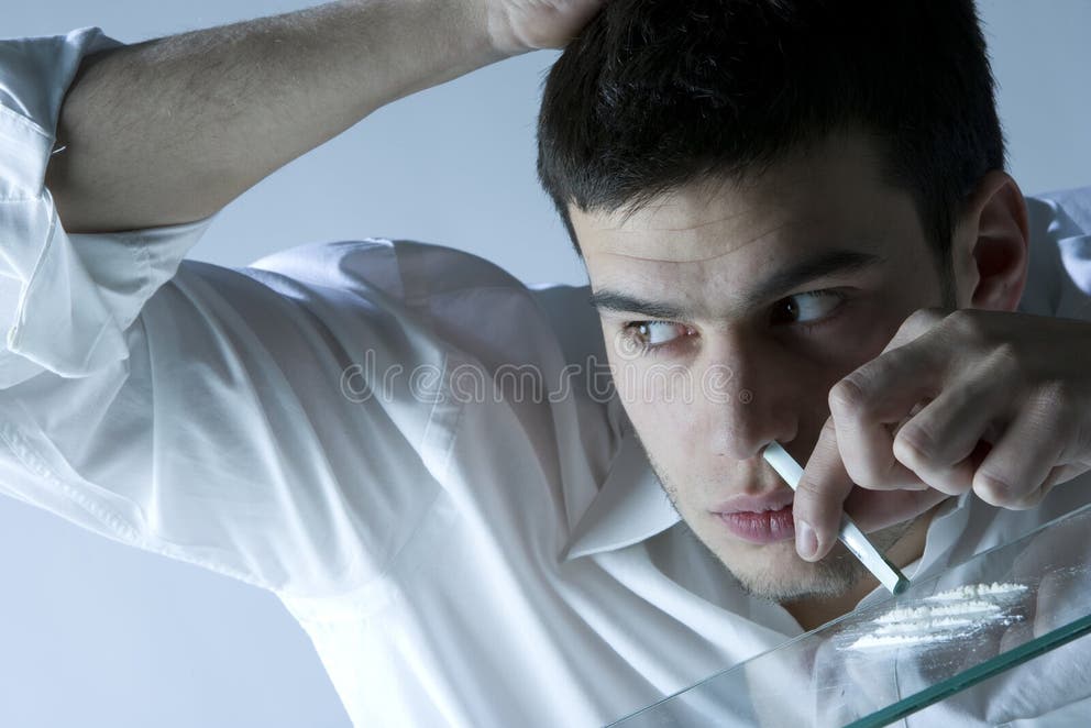 Man sniffing cocaine. stock photo. Image of finger, addiction - 8969340