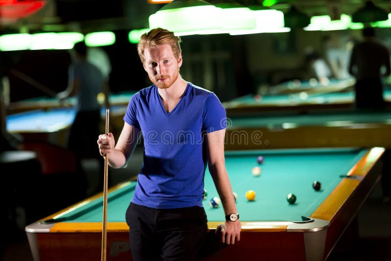 Man with snooker stick stock photo. Image of person, blue - 75495792