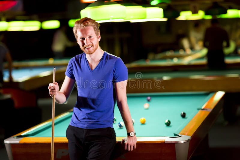 Man with snooker stick stock image. Image of professional - 75544667
