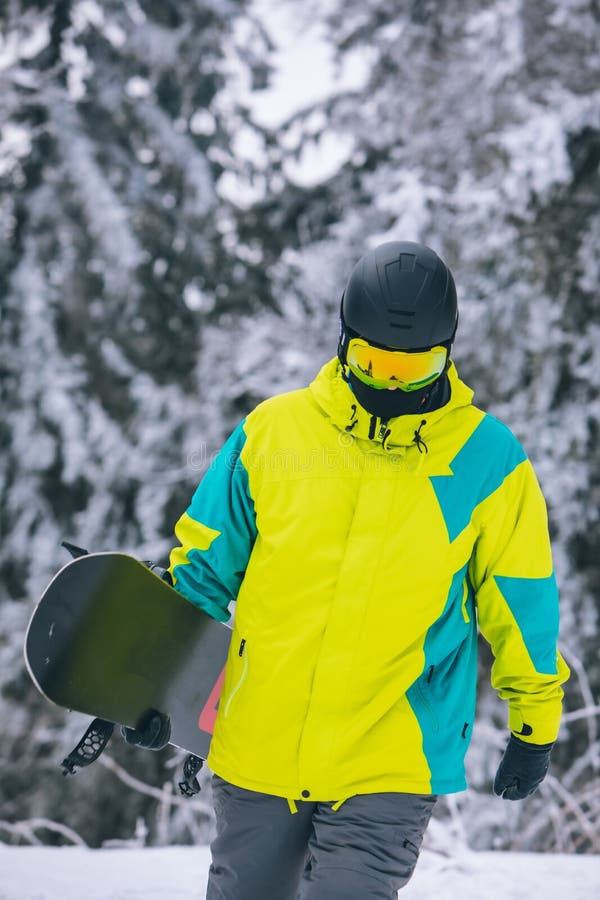 Man with Snowboard Walking by Snowed Hill Stock Image - Image of ...