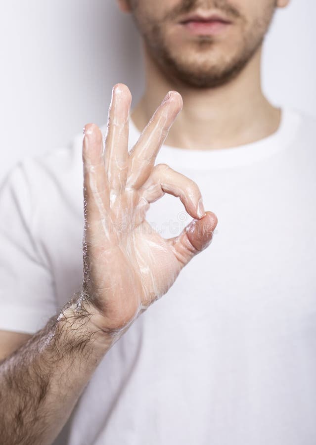 Man with a soapy hand stock photo. Image of hand, people - 178307018