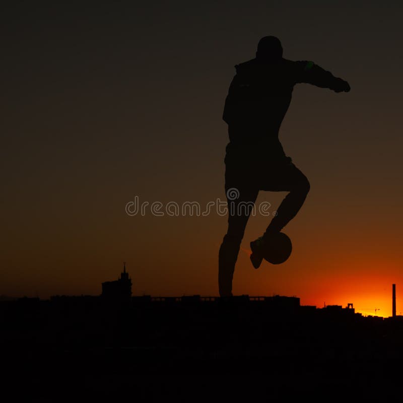 Man Soccer Player Playing with Ball during Sunset Silhouetted Stock ...