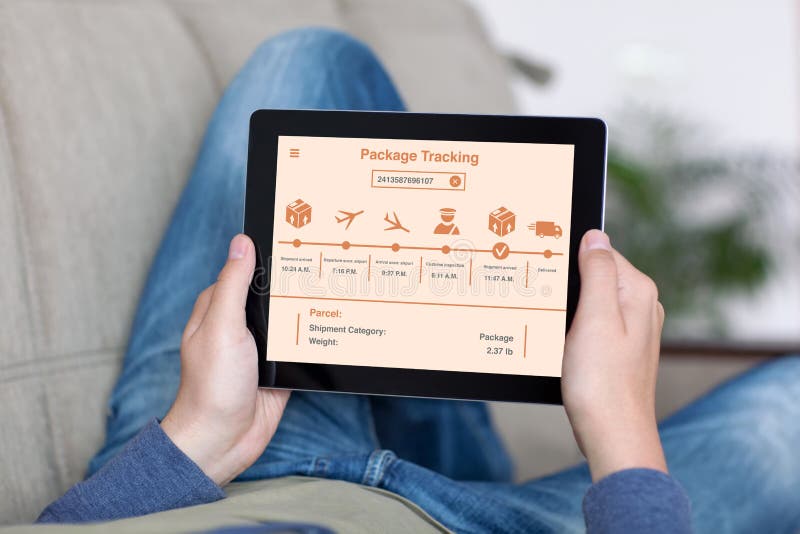 Man on Sofa Holding Tablet App Package Tracking on Screen Stock Image ...
