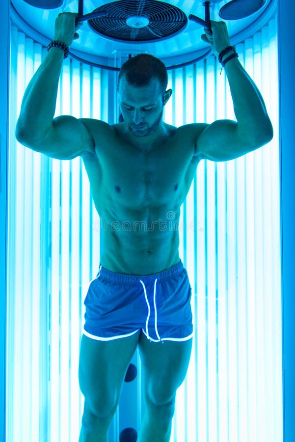 Man in Solarium stock image. Image of muscular, standing - 62536655