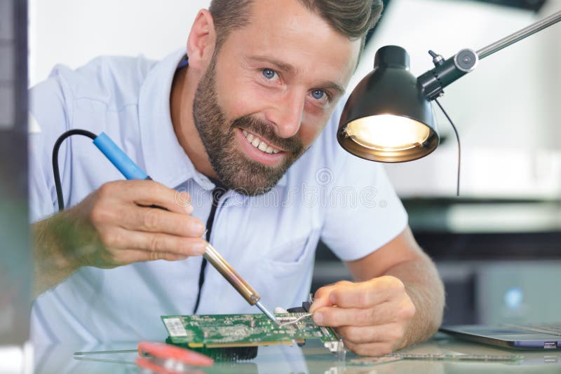 Man soldering stock image. Image of manufacturing, iron - 44099087