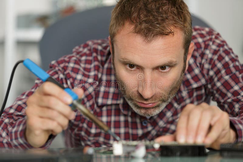 Soldering Electronic Parts on Board Stock Photo - Image of engineering ...